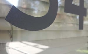 Vinyl Lettering vs Clear Window Decals | Signs.com Blog